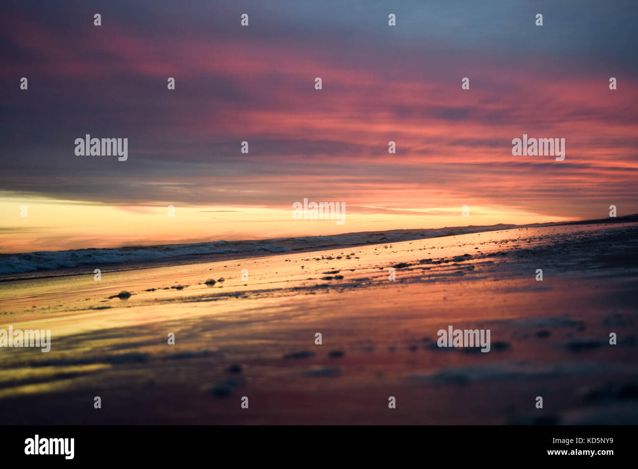 Reflection of the sunset on the ocean at Nelson Bay, Port Stephen ...