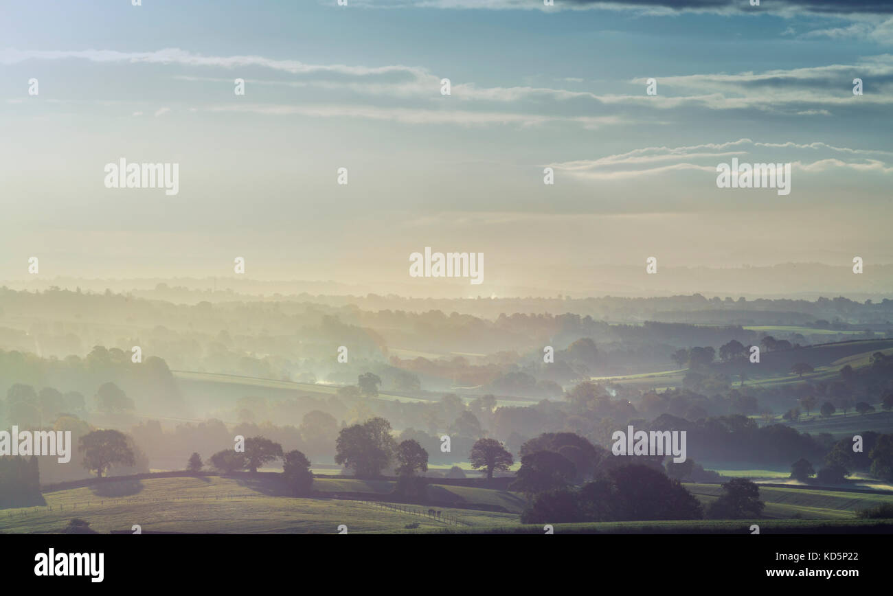 British Countryside Landscape in Morning Mist Stock Photo - Alamy
