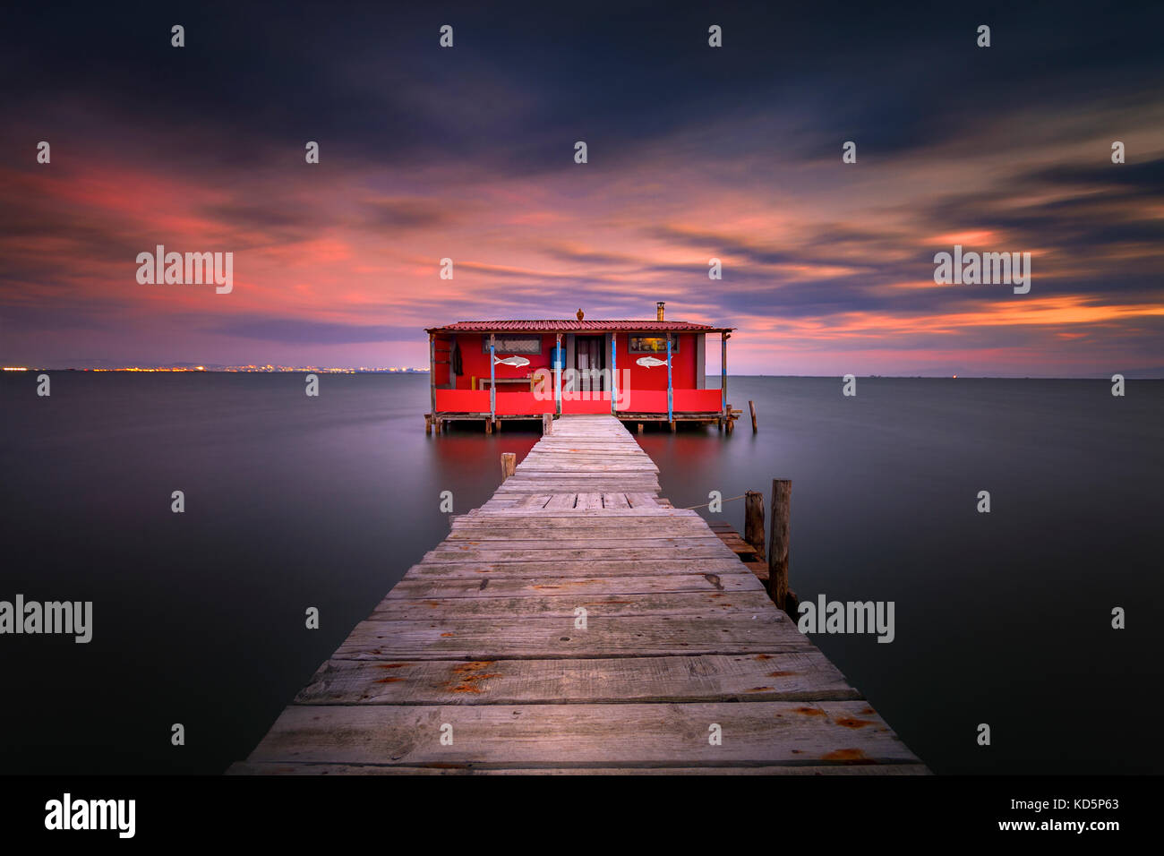 A fisherman's red cabin in axios river delta, Thessaloniki, Greece ...
