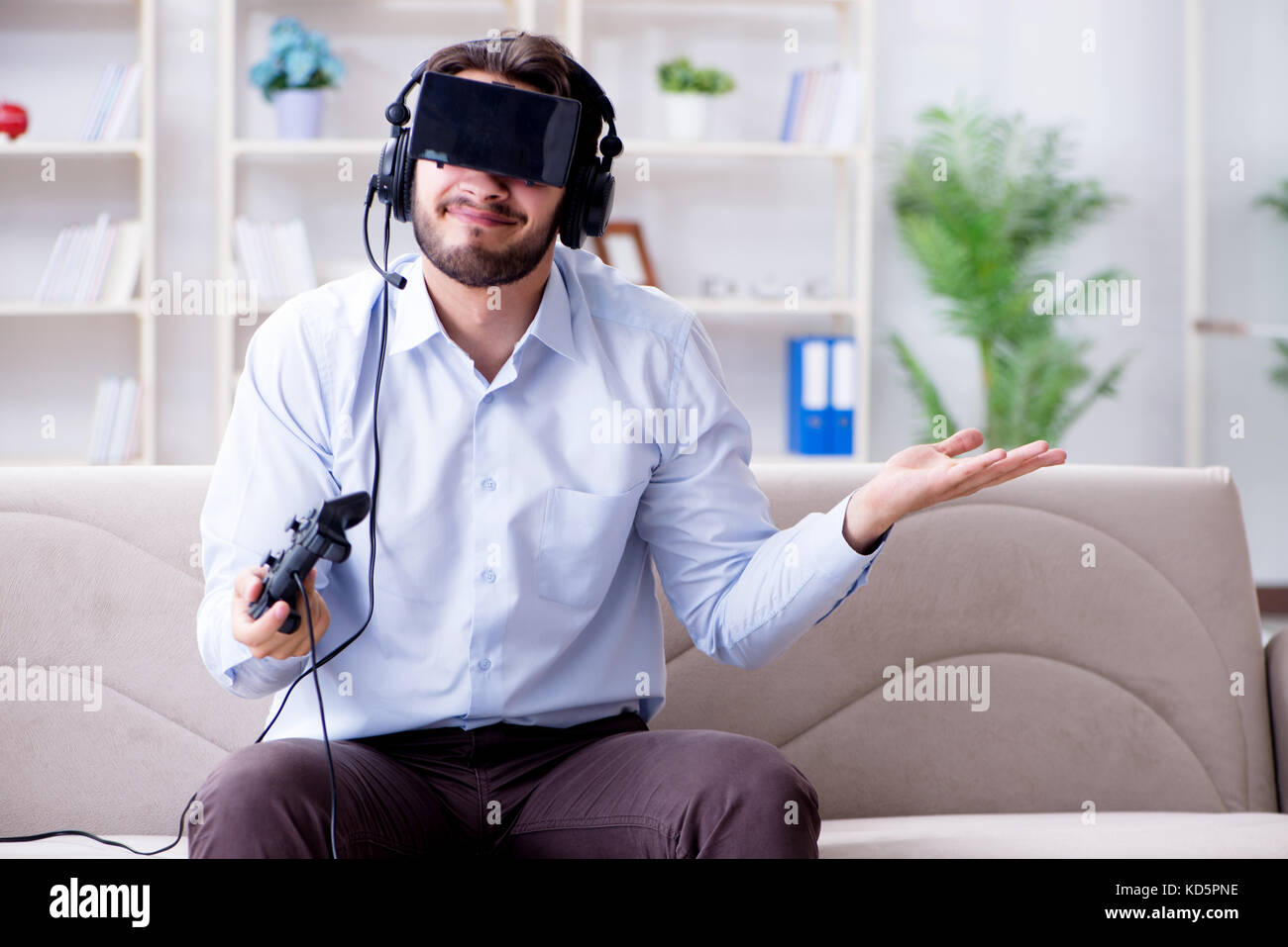 Student gamer playing games at home Stock Photo - Alamy