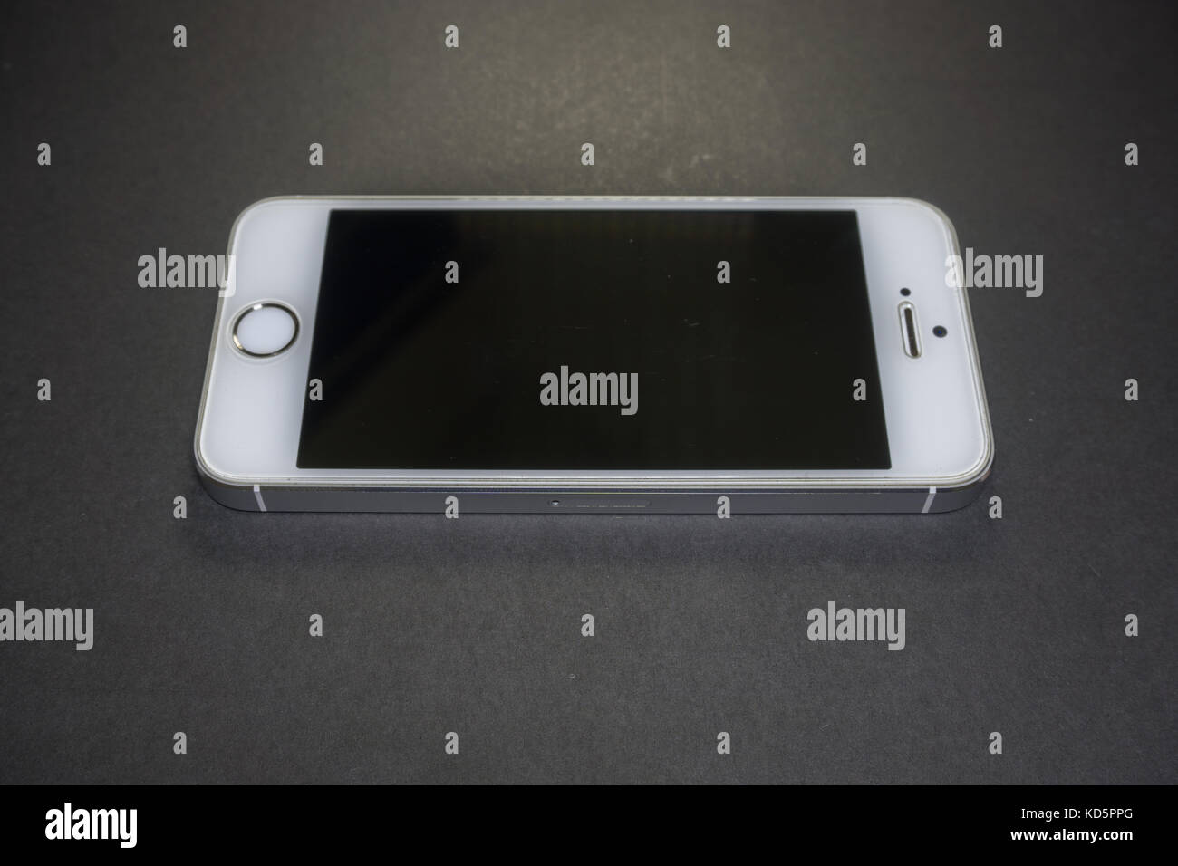 mobile smartphone isolated in black Stock Photo - Alamy