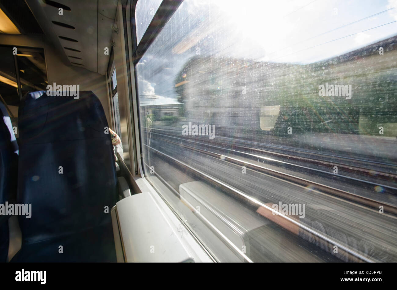 Cityscape from the window of the train Stock Photo - Alamy