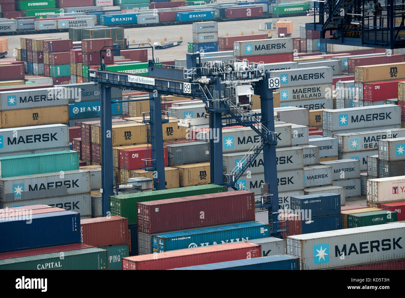 Shipping containers in container port and on-board ship Stock Photo - Alamy