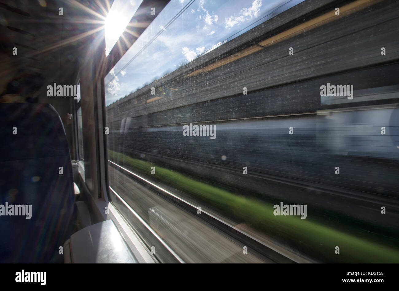 View of the city from the window of the train Stock Photo - Alamy