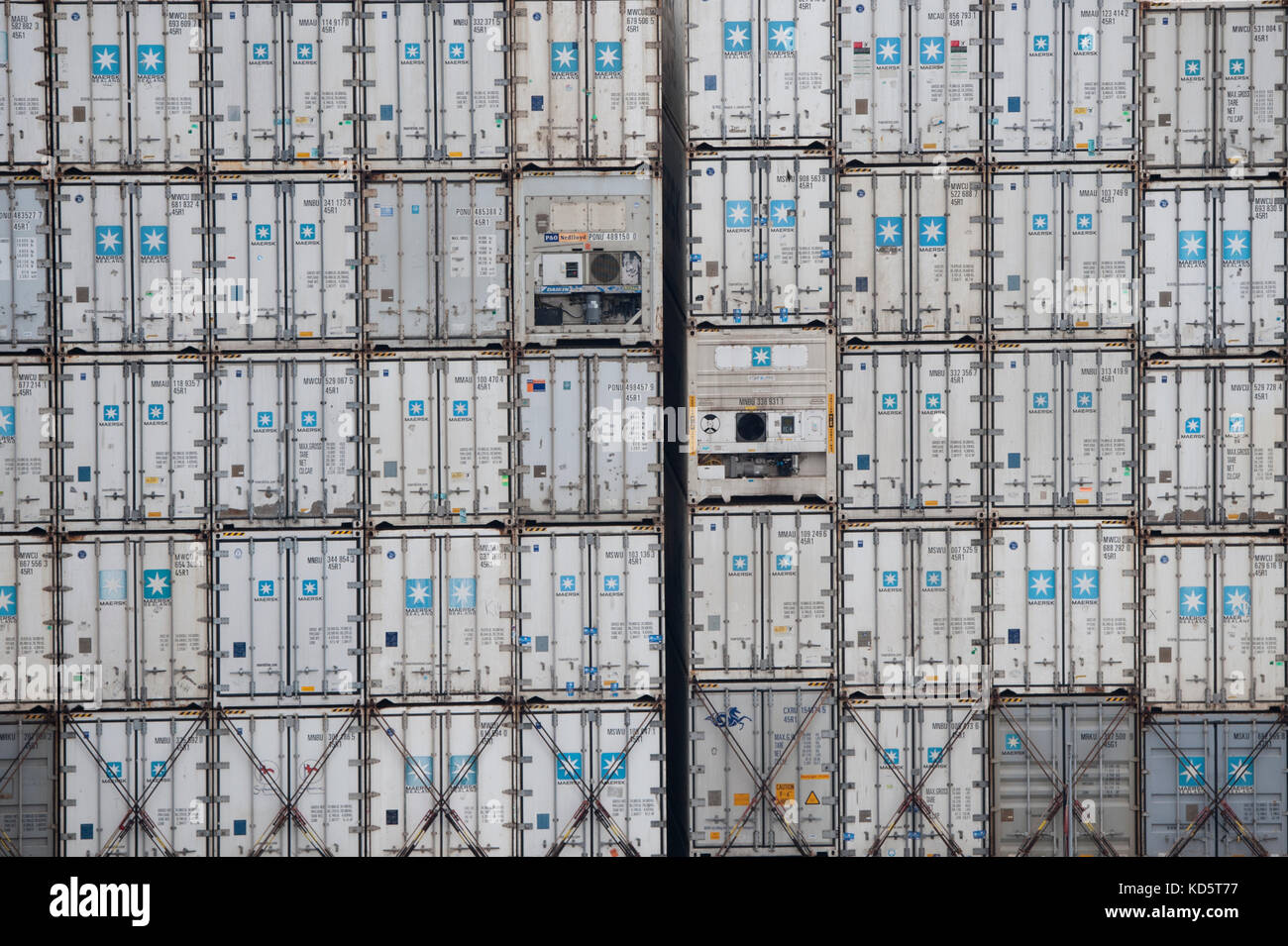 Shipping containers in container port and on-board ship Stock Photo - Alamy
