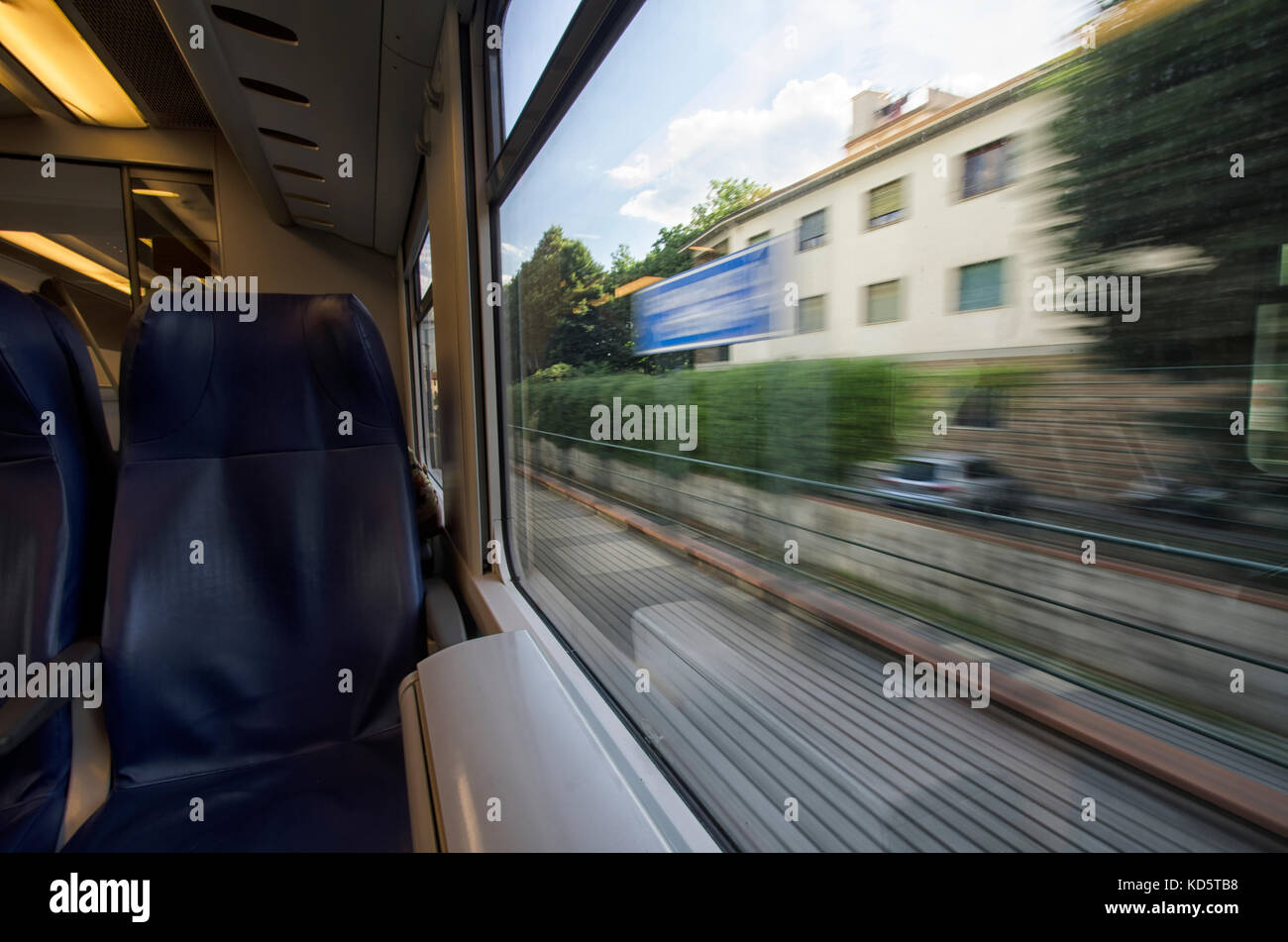 View of a small station from the train Stock Photo - Alamy