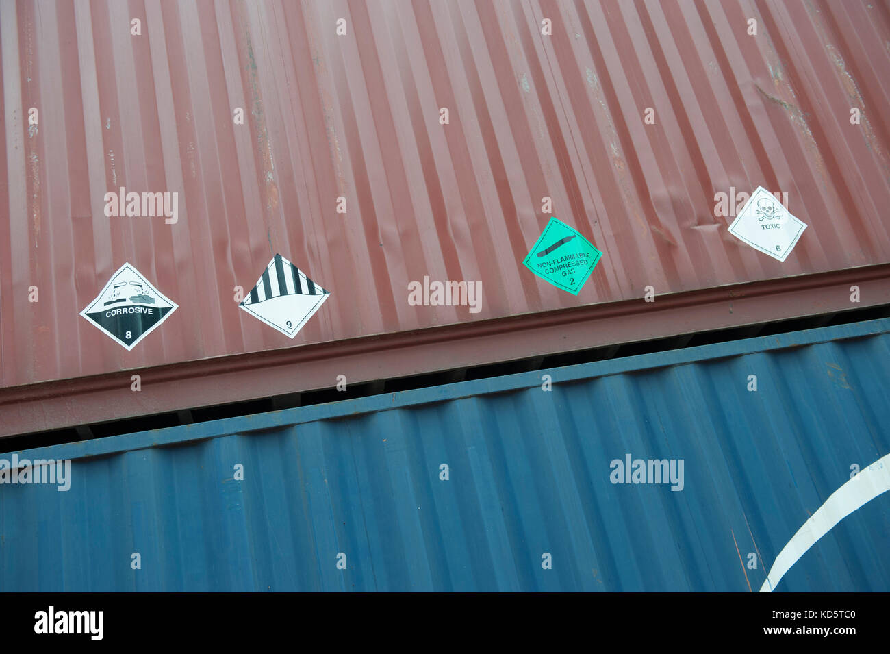 Shipping containers in container port and on-board ship Stock Photo - Alamy