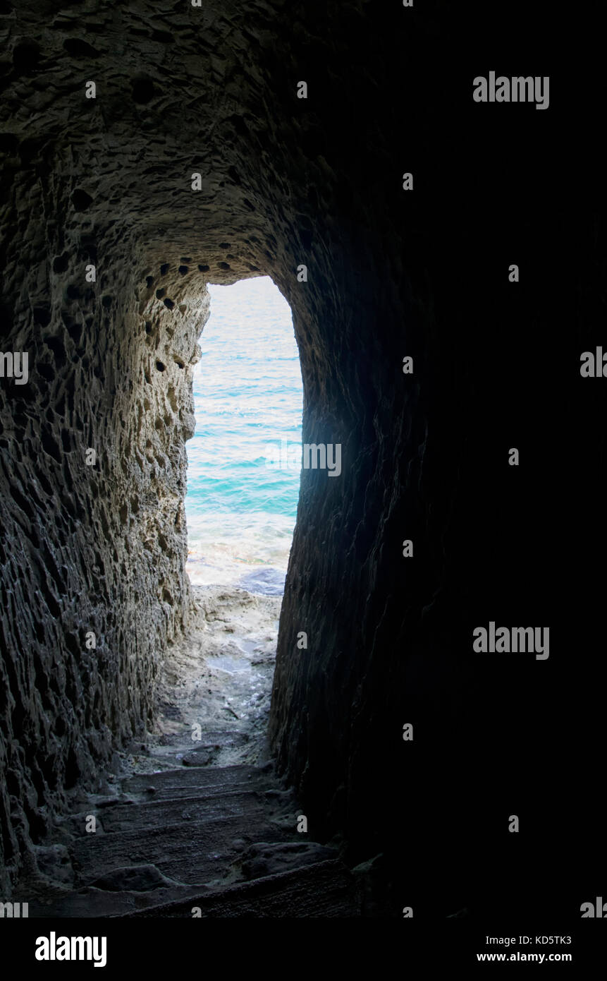 View of hidden passage overlooking the sea Stock Photo - Alamy