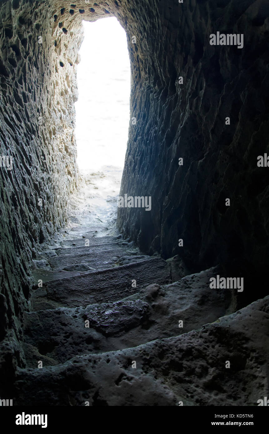 View of mysterious passage overlooking the sea Stock Photo - Alamy