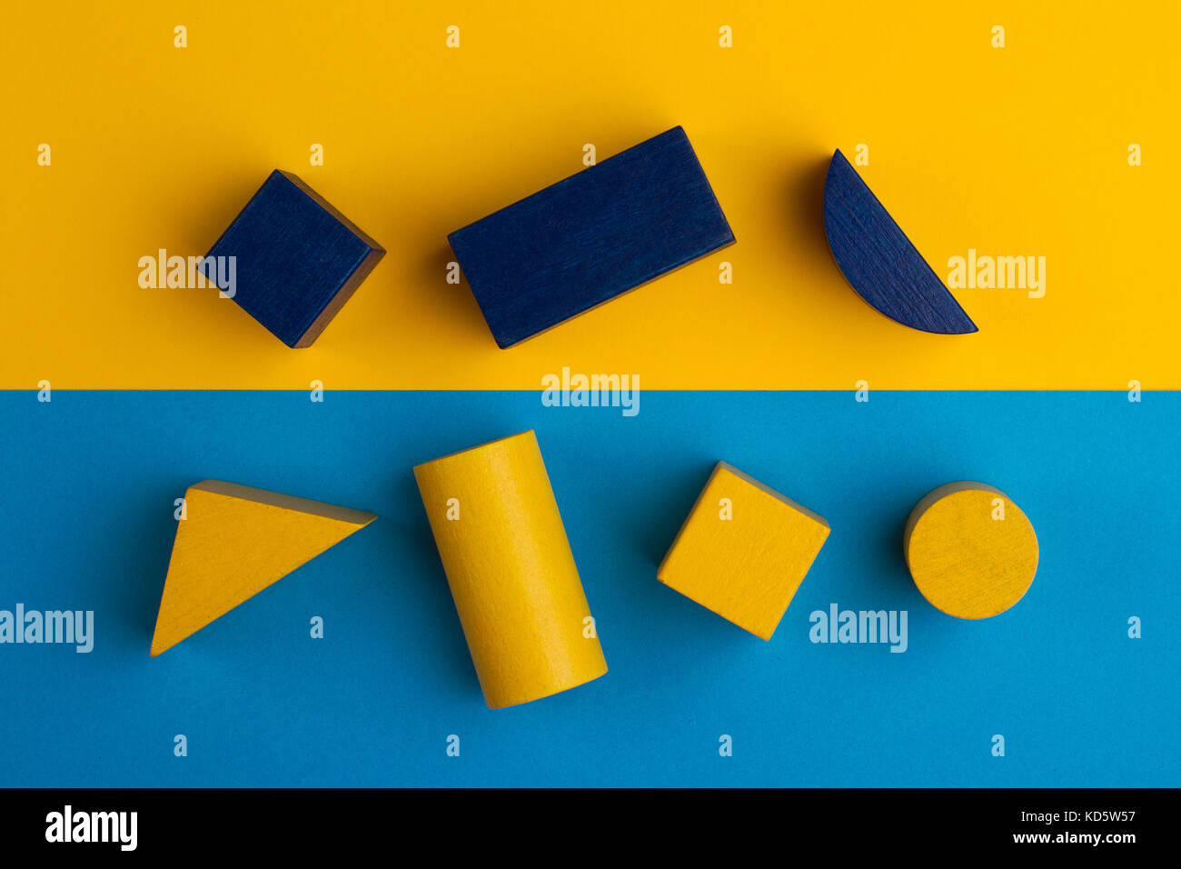 abstract color composition with yellow and blue wood toy building ...