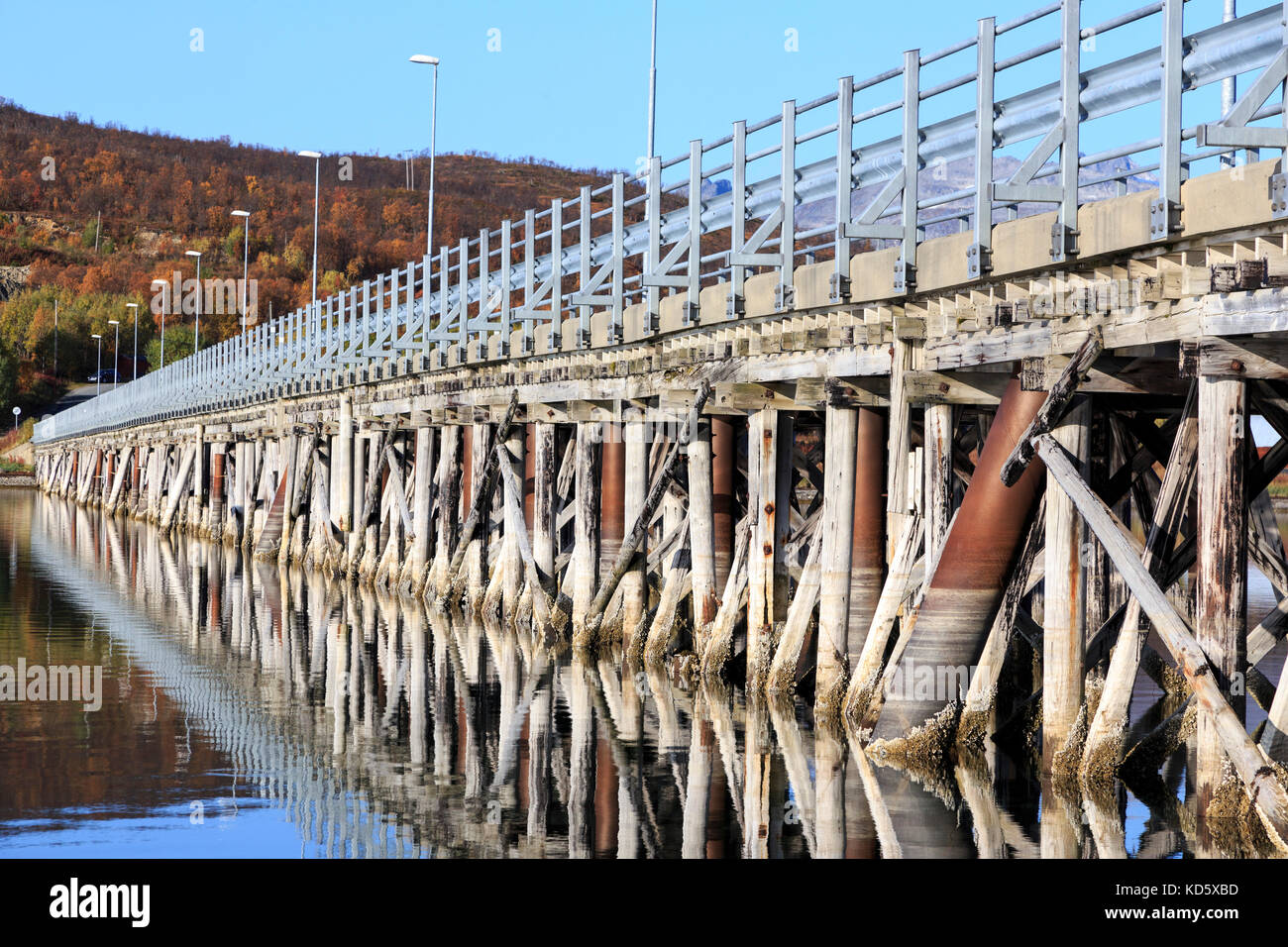 Autumn , 2017, Single track wooden and concrete bridge leading to ...