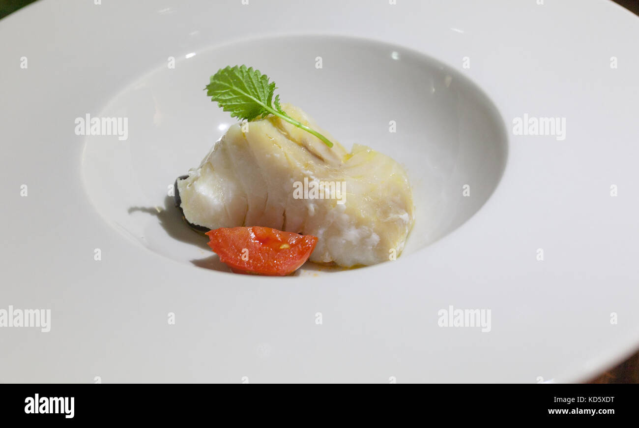 dish of salt cod in low-temperature frying Stock Photo - Alamy