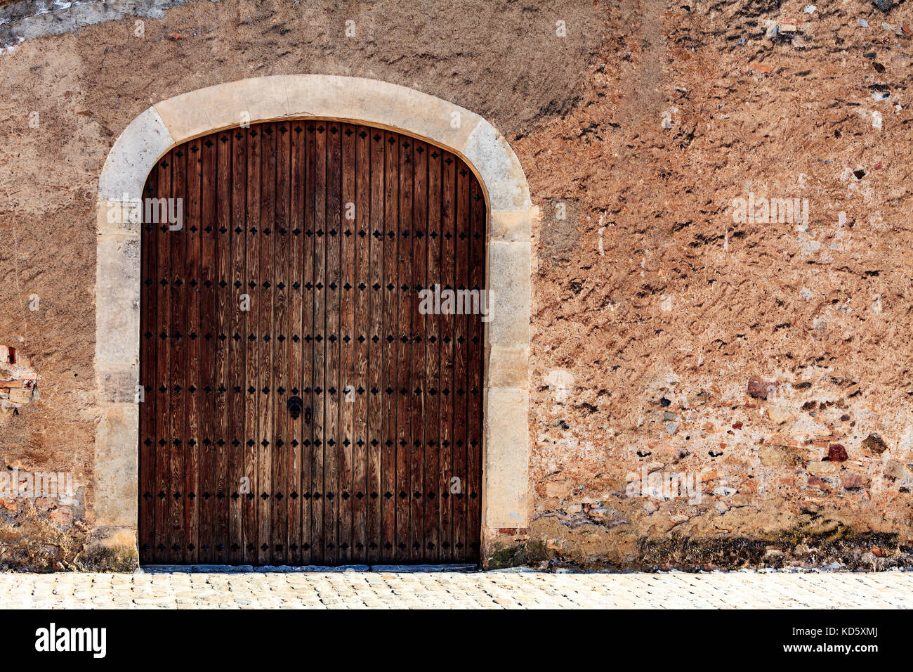 Old gates of medieval building Stock Photo - Alamy