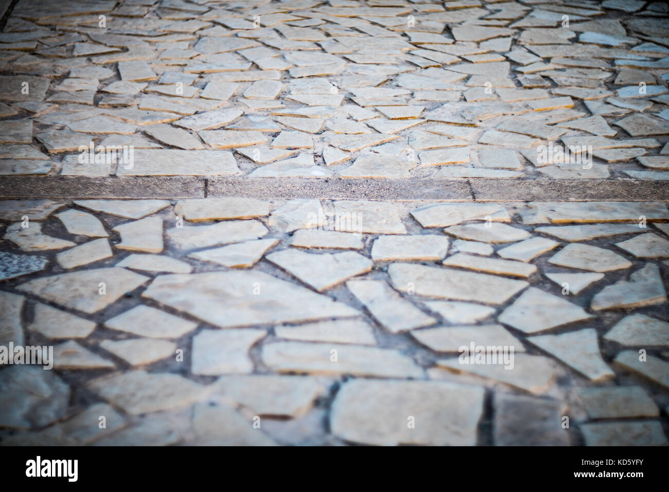 Old outdoor stone pavement in perspective Stock Photo - Alamy