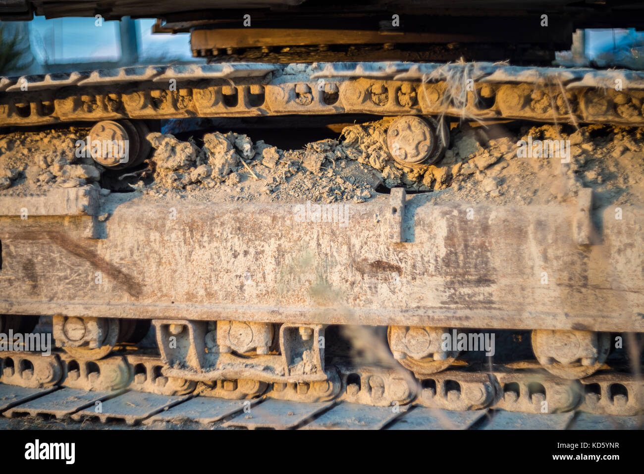 Working excavator in a construction site - machine moving soil Stock ...