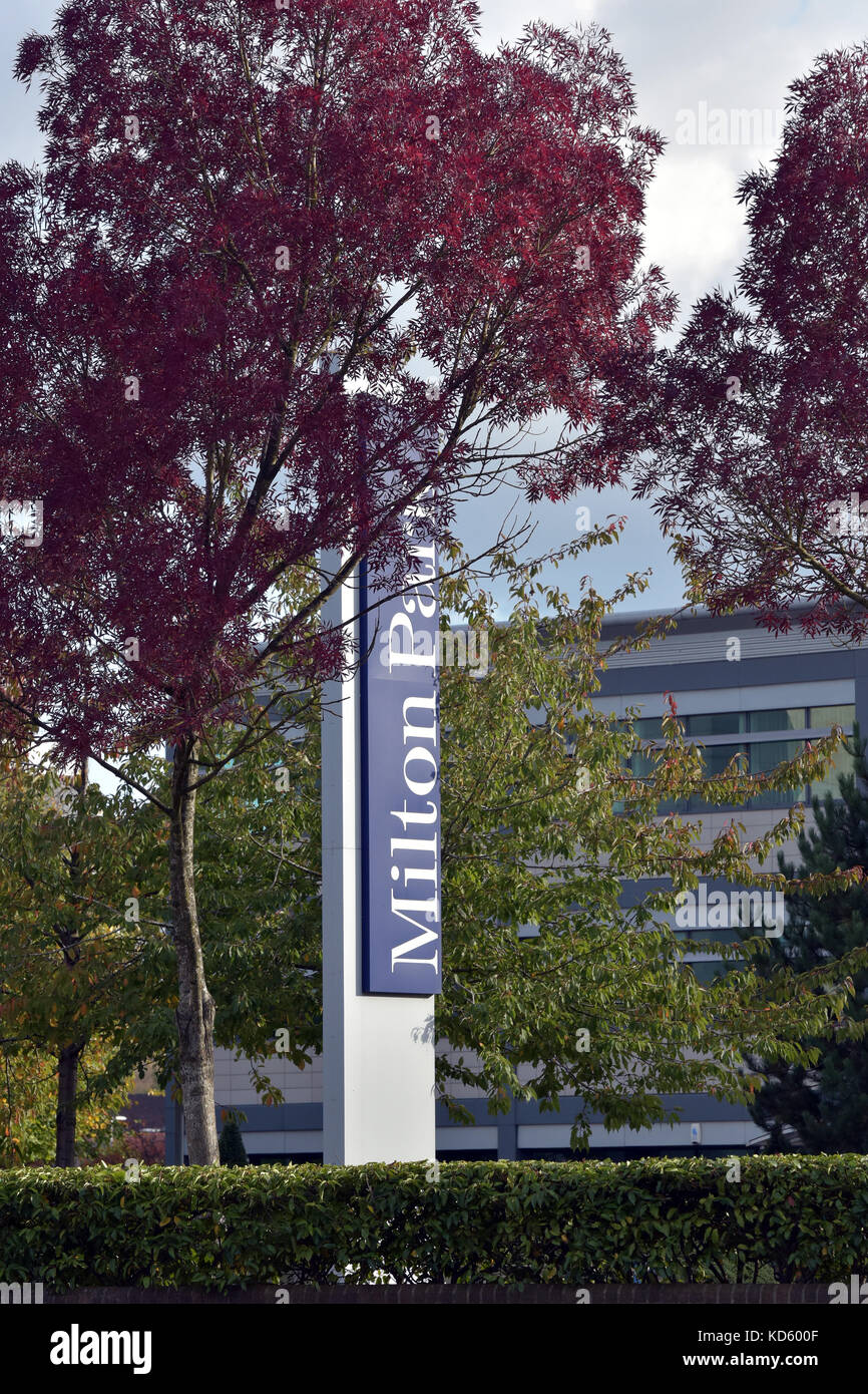 A blue signpost at the entrance to Milton park technology and business ...