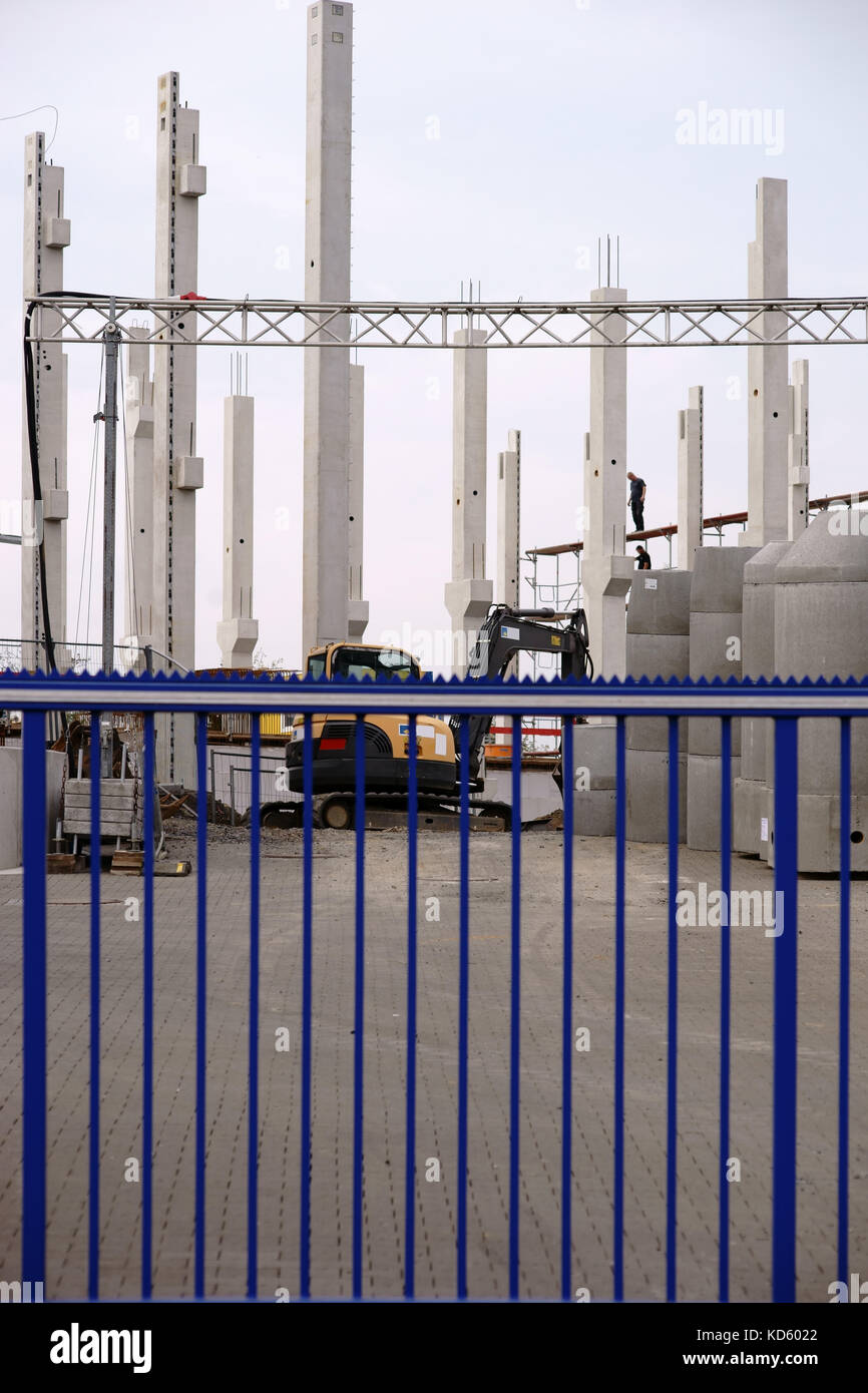 The new construction of a raw material factory with the foundation of ...