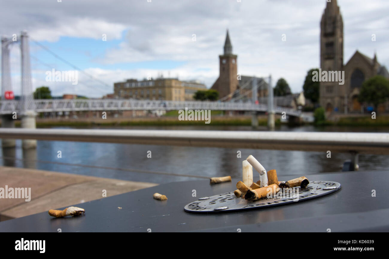 Stubbed out cigarettes on stubber litter bin by the River Ness ...
