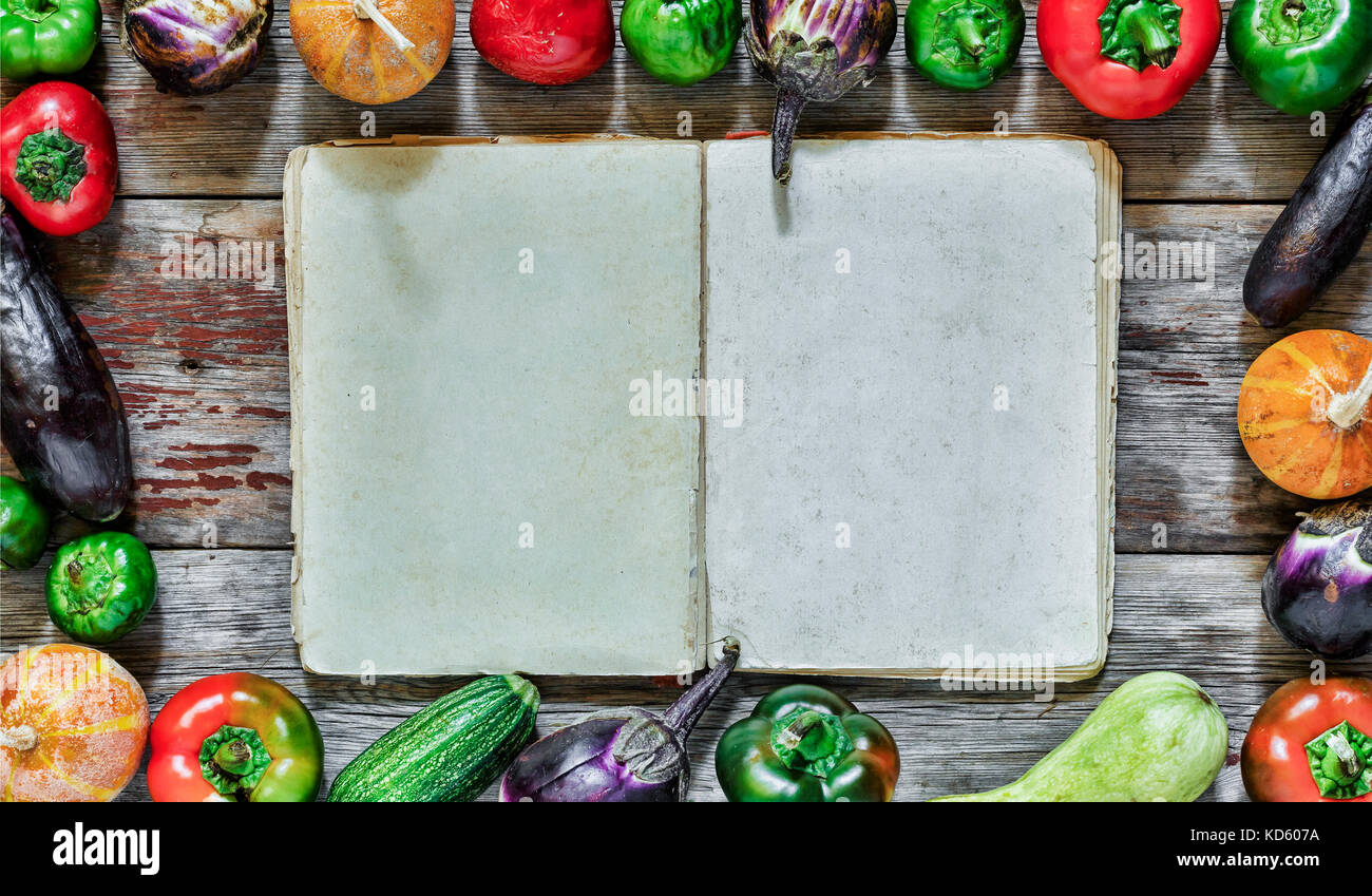 Frame of food. Autumn seasonal products around an open cookbook with ...