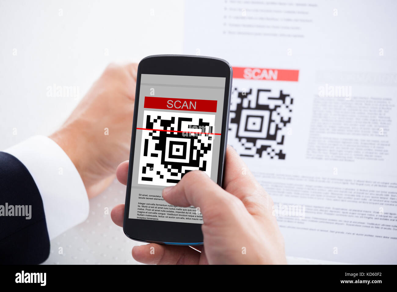 Close-up Of Businessman Scanning A Barcode Using Cell Phone Stock Photo ...
