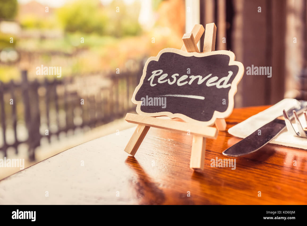 a cute wooden blackboard, chalkboard, easel as a reserved sign on a ...