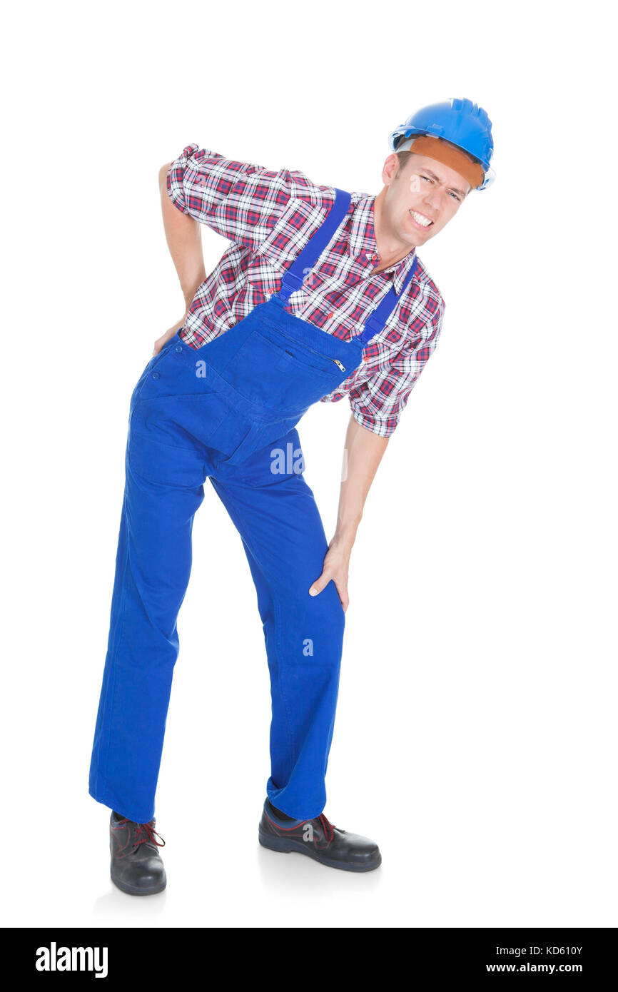 Portrait Of A Worker With Back Pain Isolated On White Background Stock ...
