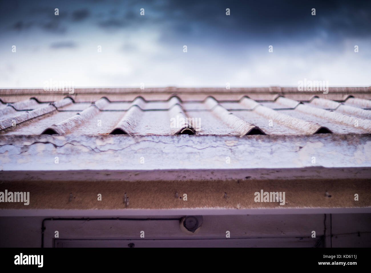 Damaged roof of old abandoned house Stock Photo - Alamy