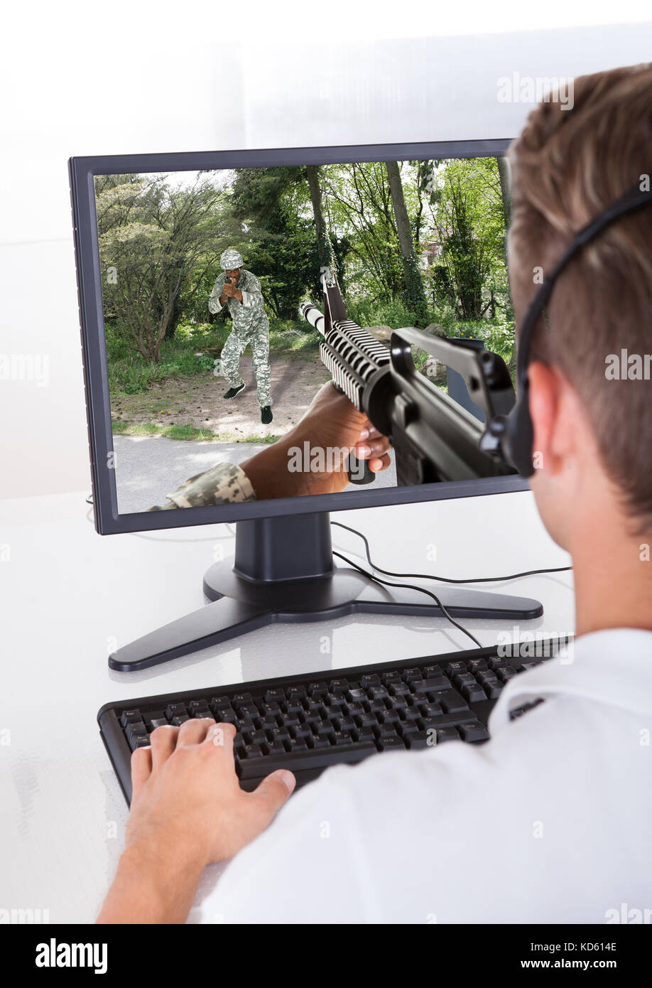 Photo Of Young Man Playing Computer Games Stock Photo - Alamy