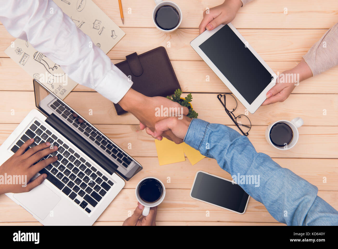 Confident business handshake. Top view of two business people shaking ...