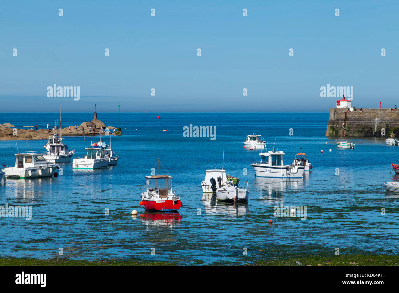 Barfleur (northern France): the harbour at low tide with boats stranded ...