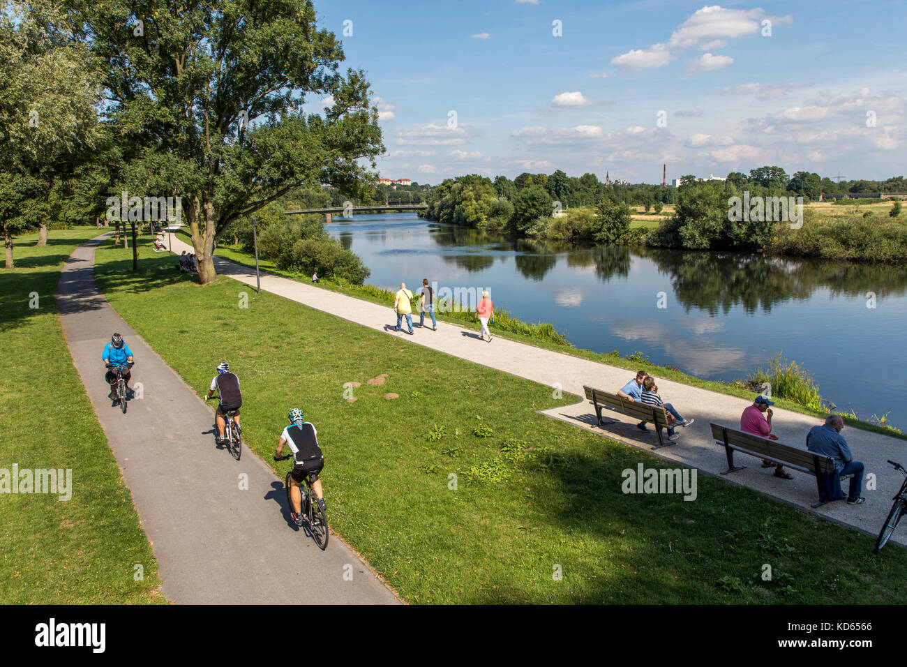 Bike path, along old railway tracks in Essen, Germany, along river Ruhr ...