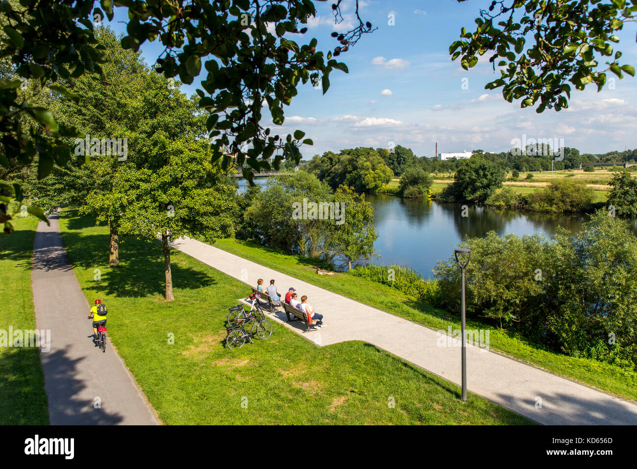 Bike path, along old railway tracks in Essen, Germany, along river Ruhr ...
