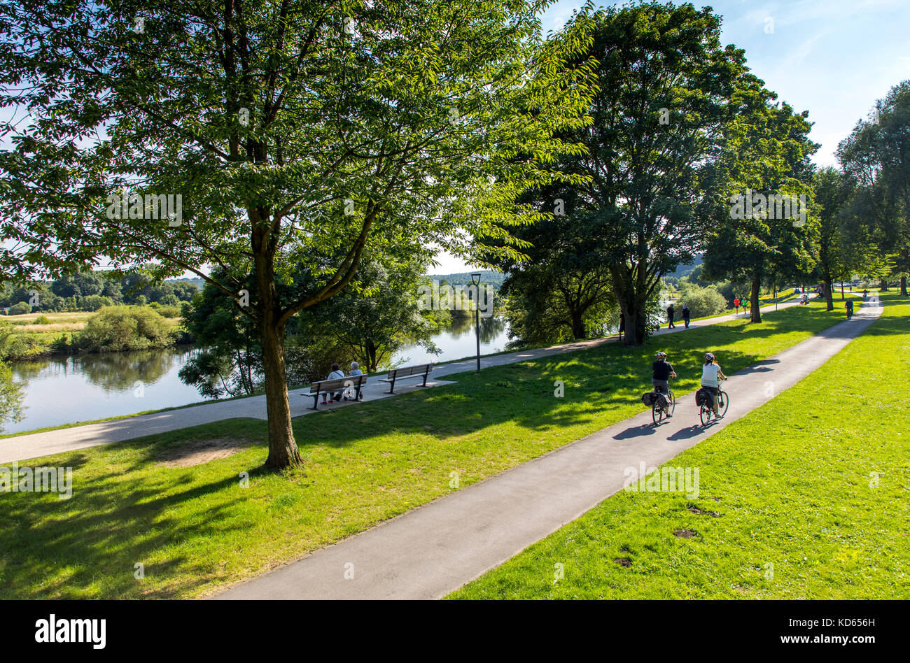 Bike path, along old railway tracks in Essen, Germany, along river Ruhr ...