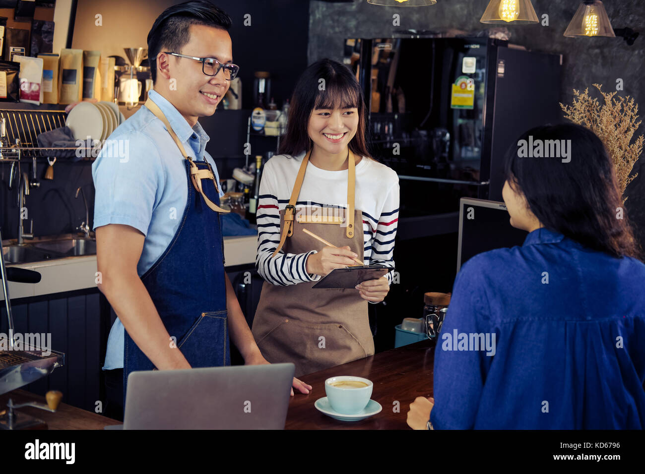 Young person ordering food hi-res stock photography and images - Alamy