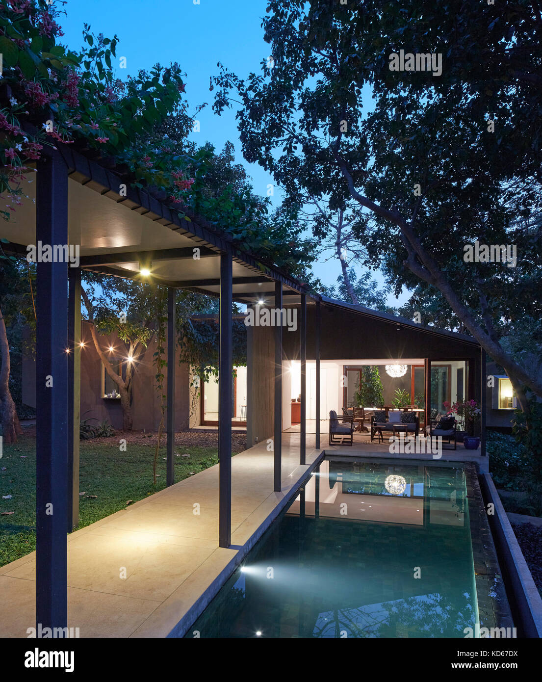 View from main entrance approach at dusk. House on a stream, Alibaug ...