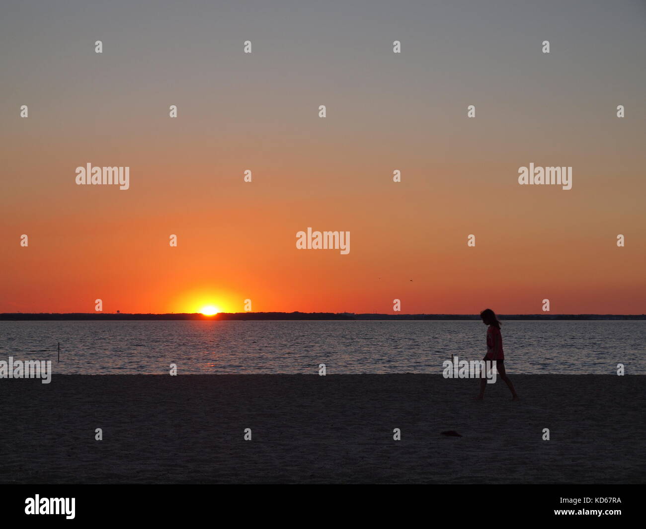 Barnegat Bay, New Jersey sunset taken on a warm summers evening while a ...