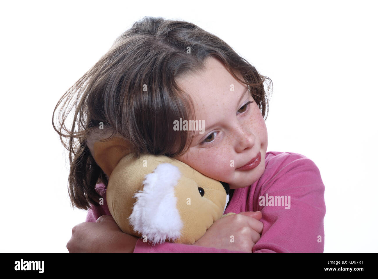 Young girl cuddling teddy bear Stock Photo - Alamy
