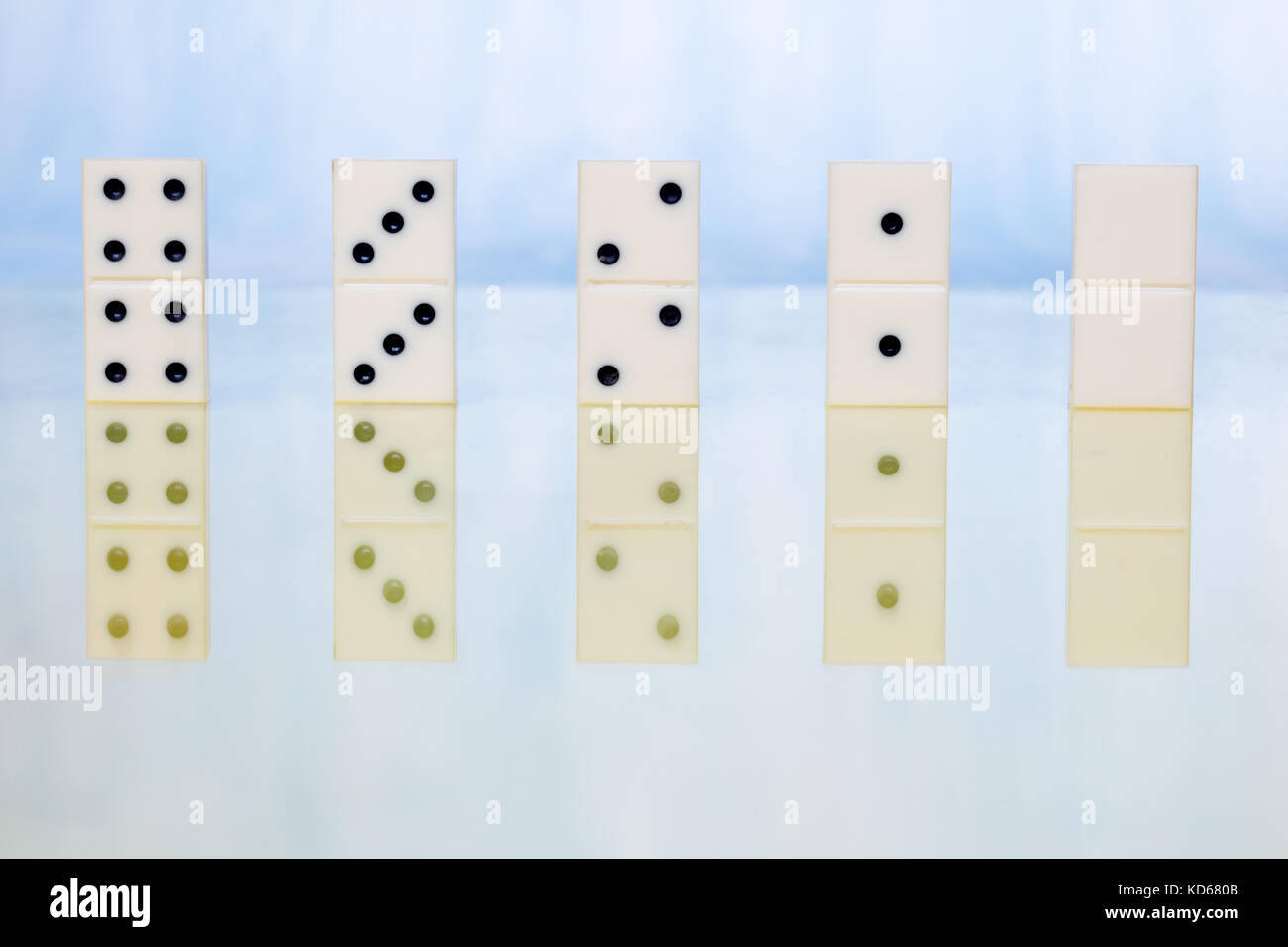 Dominoes on ligth background Stock Photo - Alamy