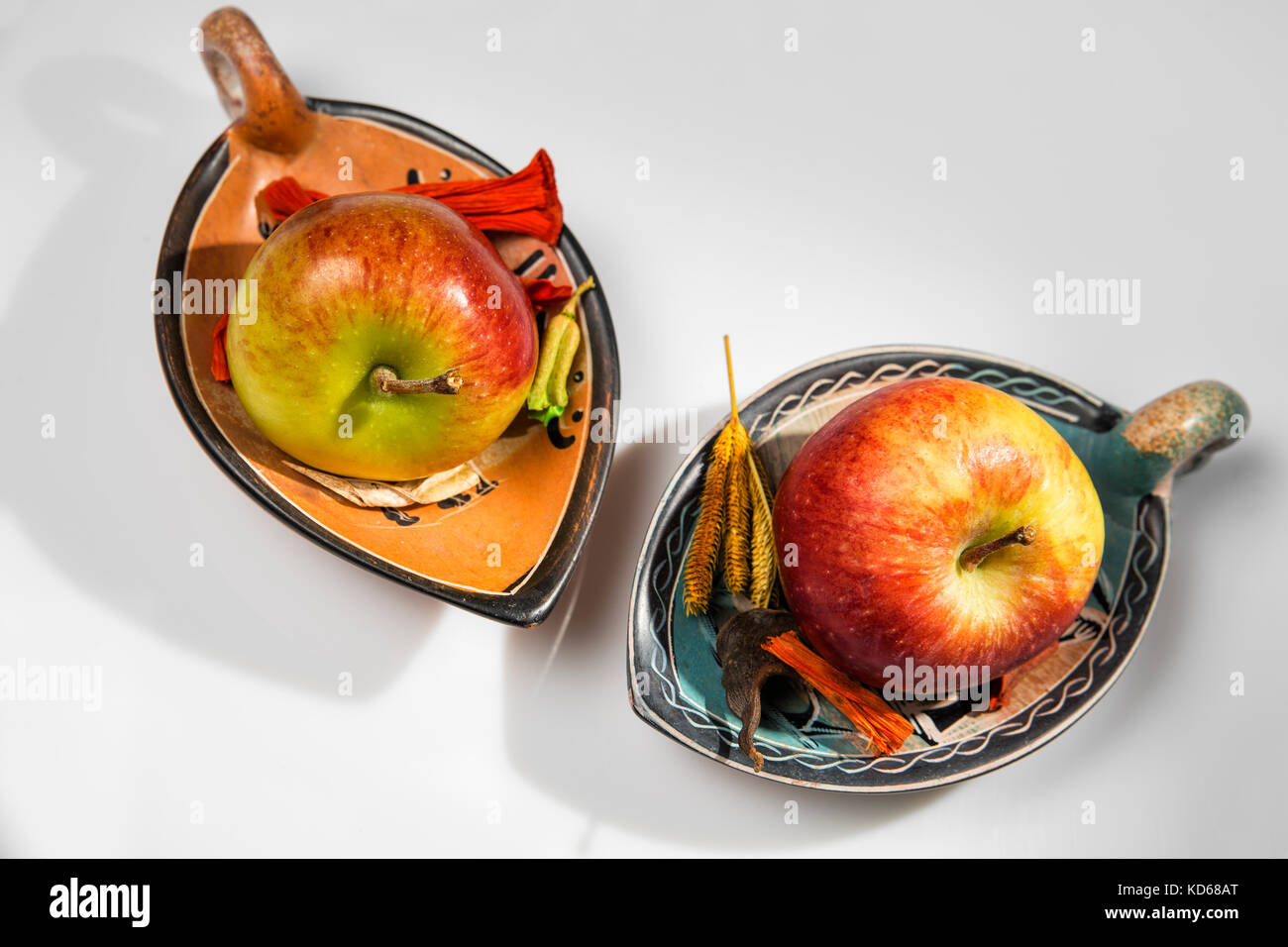 closeup two small apples on original plate.white background Stock Photo ...
