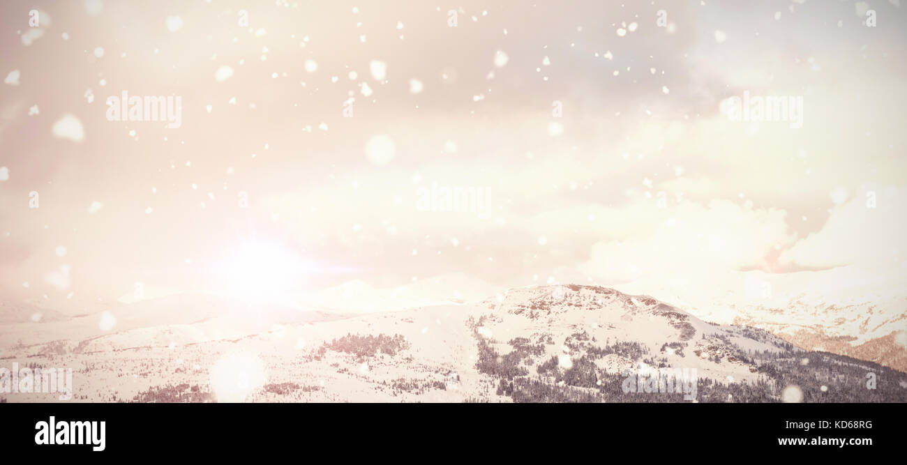 Snow falling against scenic view of snow mountains Stock Photo - Alamy