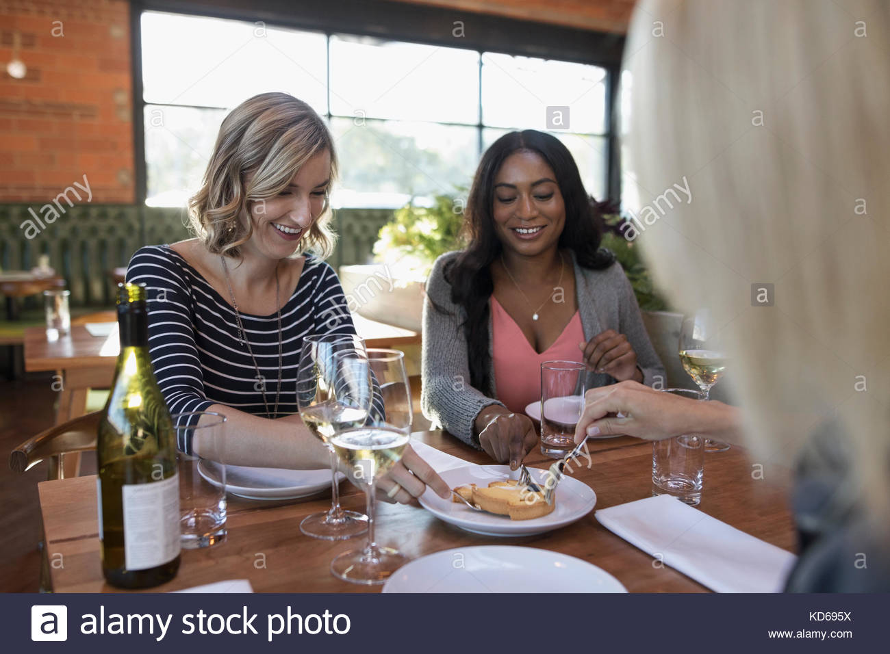 Women friends dining black woman hi-res stock photography and images ...