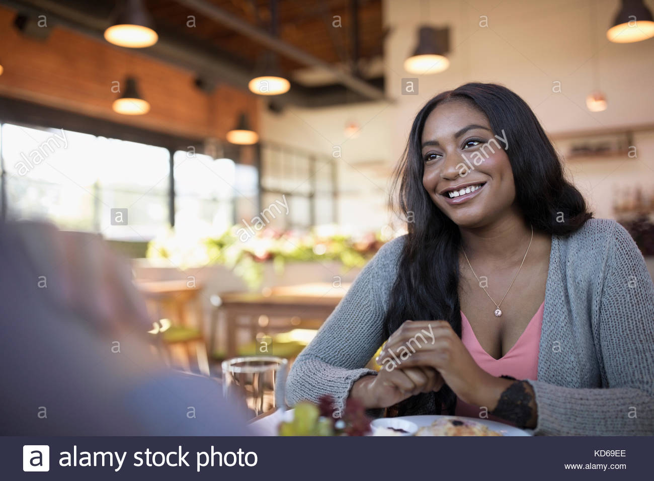 Woman and dining table hi-res stock photography and images - Alamy