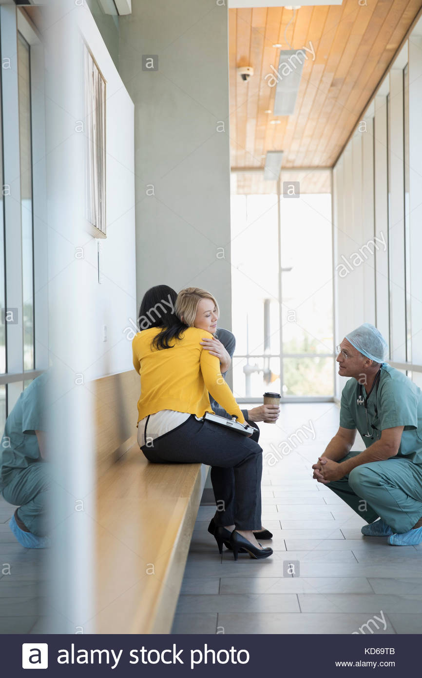 Asian doctor patient hugging hi-res stock photography and images - Alamy