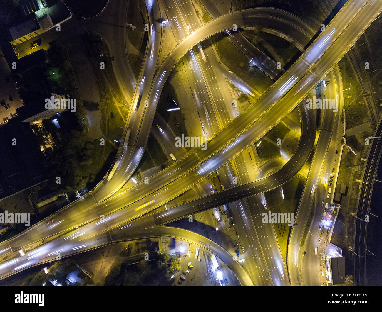 Traffic on freeway interchange. Aerial night view city traffic Stock ...