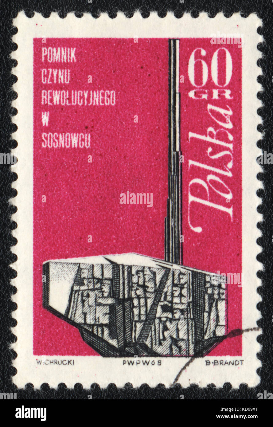 A postage stamp printed in POLAND shows monument to revolutionary ...