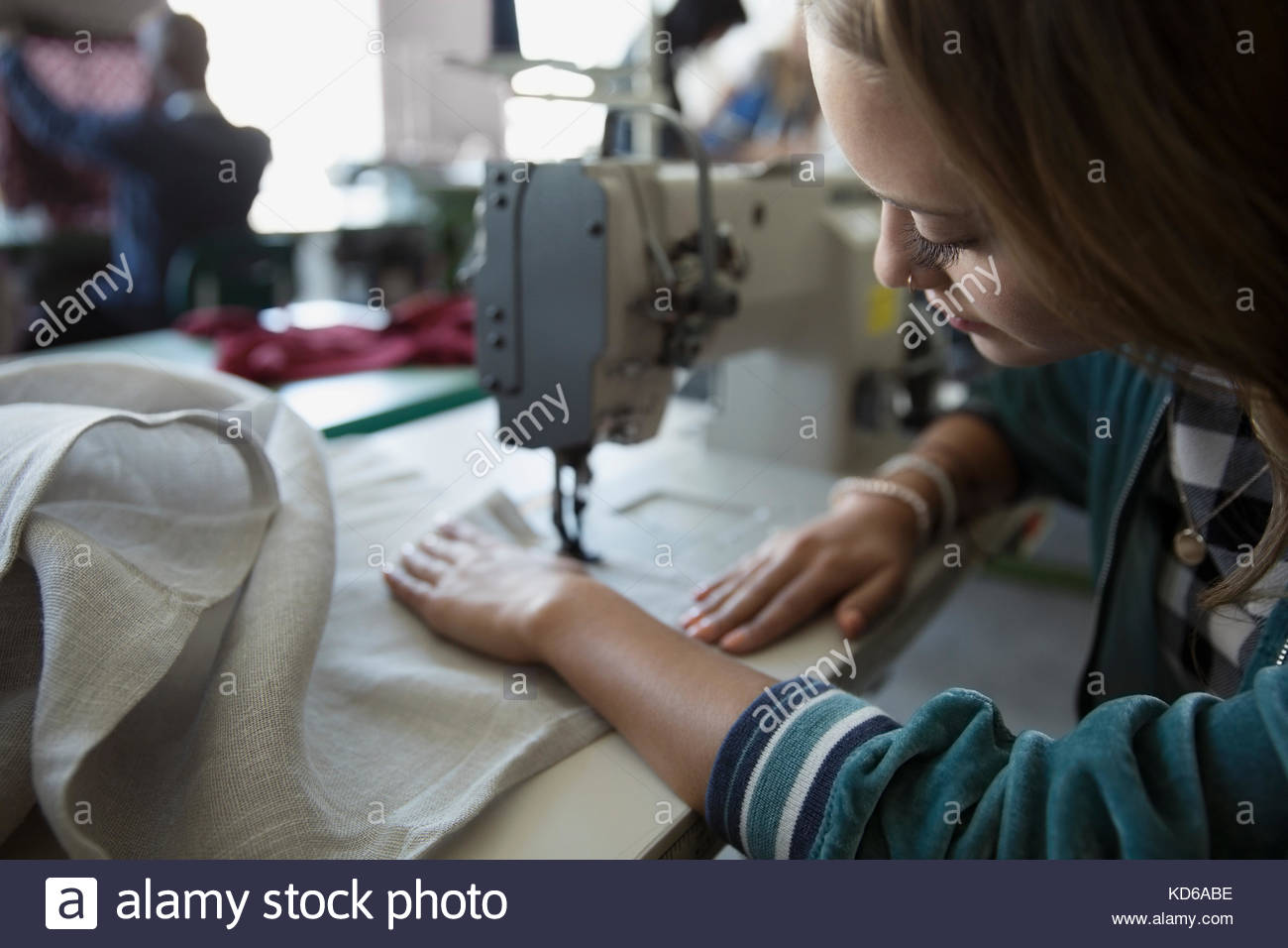 Student using sewing machine in hi-res stock photography and images - Alamy