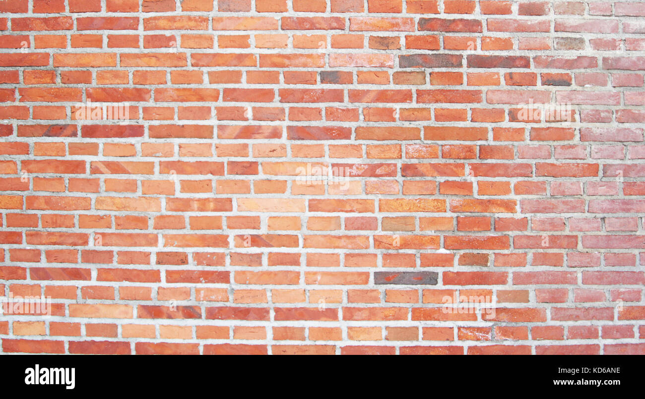 Large section of an old brick wall with different brick pattern layers ...