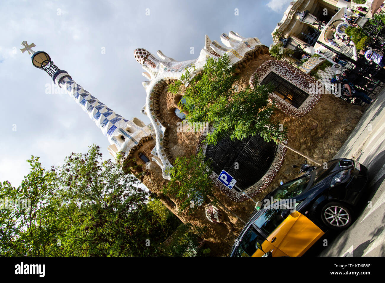 Stock Photo - Park Güell, Barcelona, Spain. Mosaic-covered buildings ...
