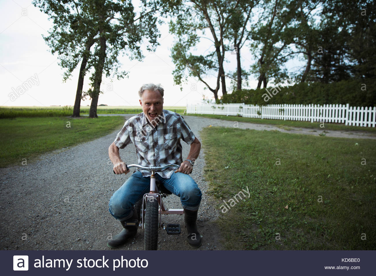 Person on tricycle hi-res stock photography and images - Alamy