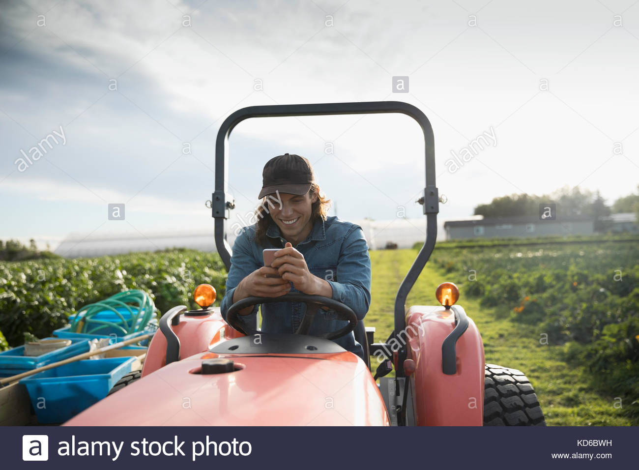 Happy farmer tractor hi-res stock photography and images - Alamy